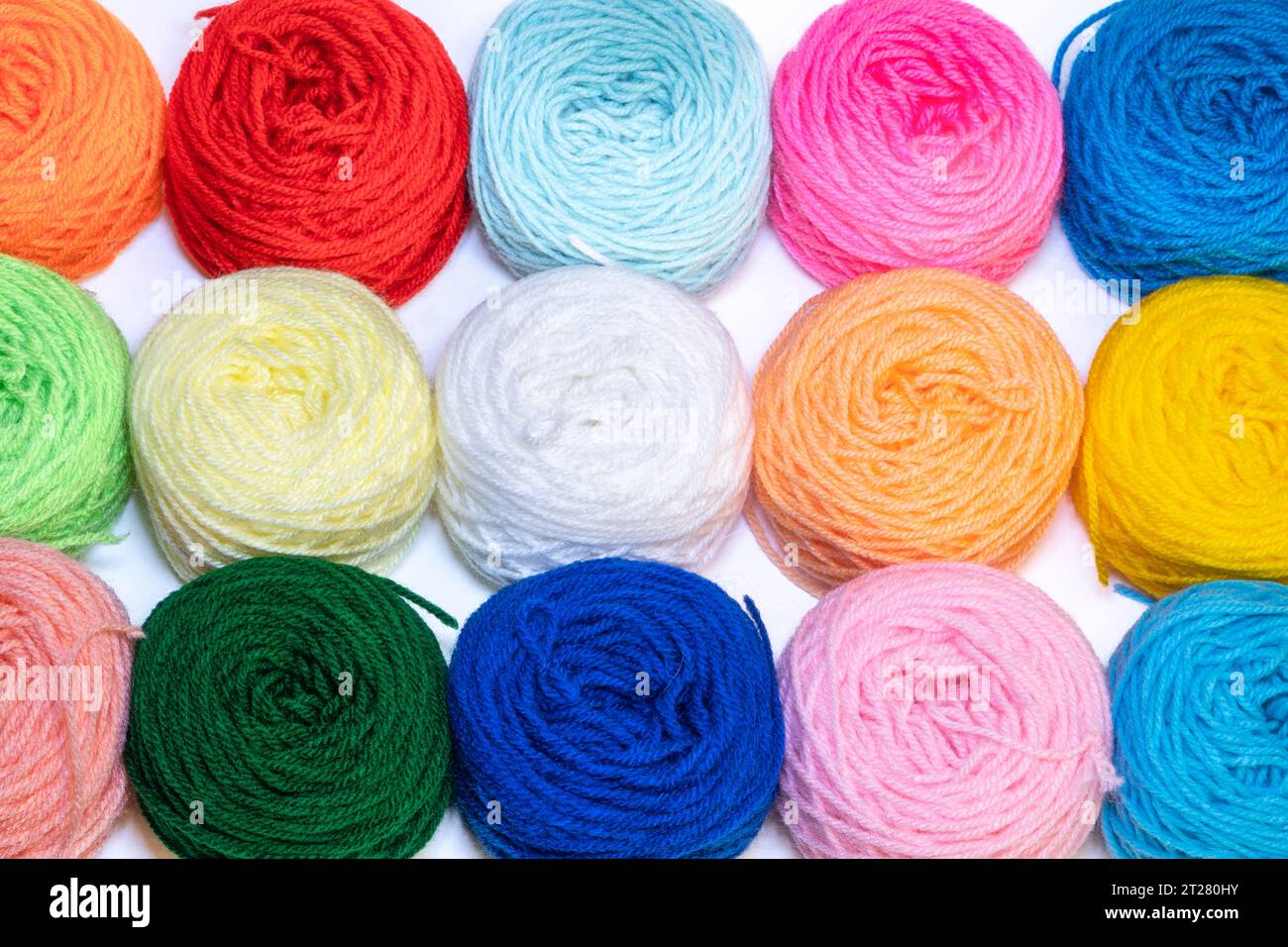 Beautiful colored wool forming a background Stock Photo - Alamy