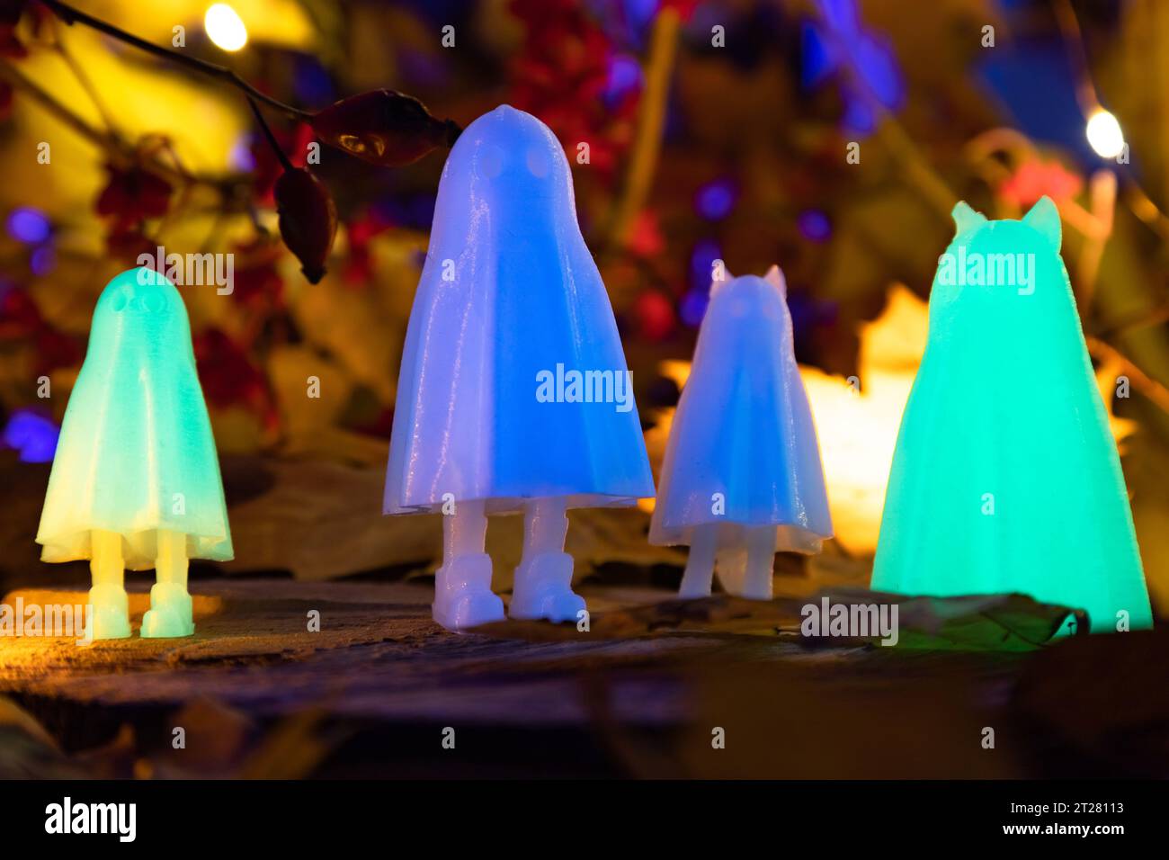 glowing ghost in the fall foliage, Halloween Stock Photo - Alamy