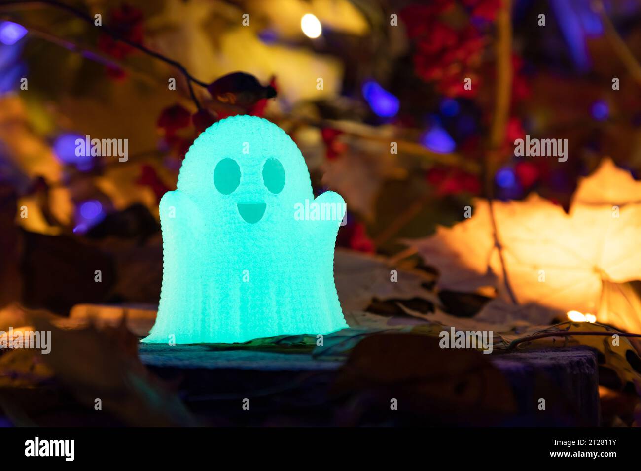 glowing ghost in the fall foliage, Halloween Stock Photo - Alamy