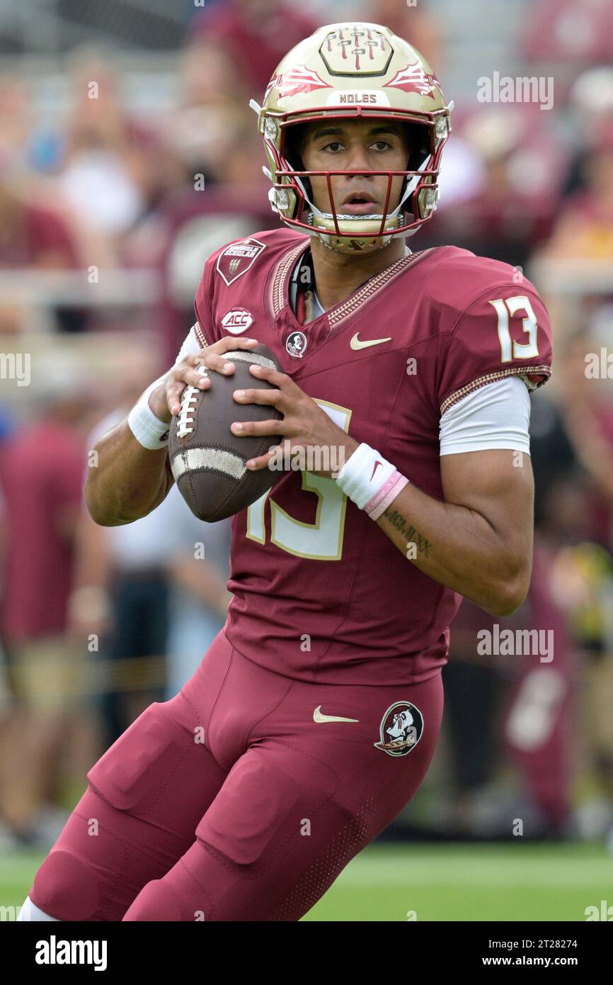 Florida State quarterback Jordan Travis (13) warms up before an NCAA ...