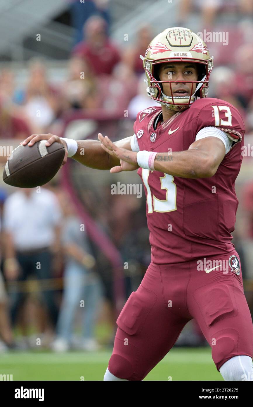 Florida State quarterback Jordan Travis (13) warms up before an NCAA ...