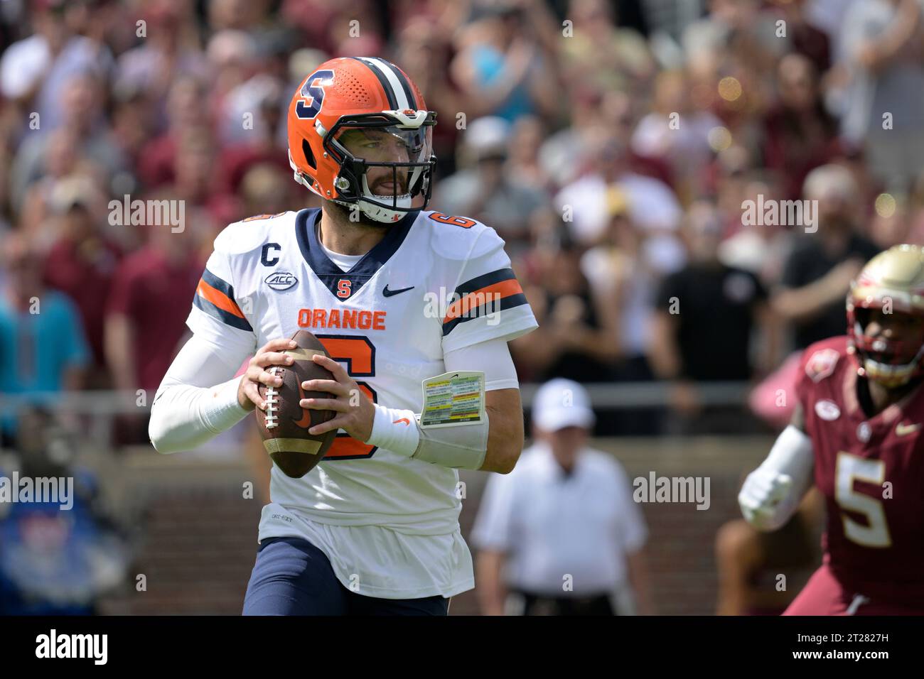 Syracuse quarterback Garrett Shrader (6) looks for a receiver as ...