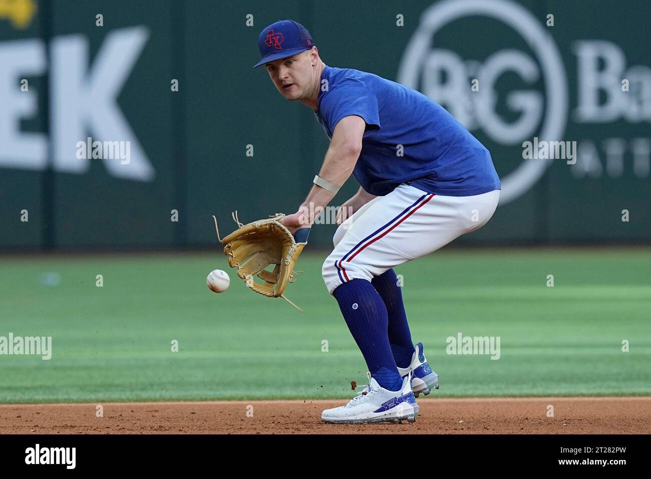 Texas Rangers third baseman Josh Jung fields a grounder during his team ...
