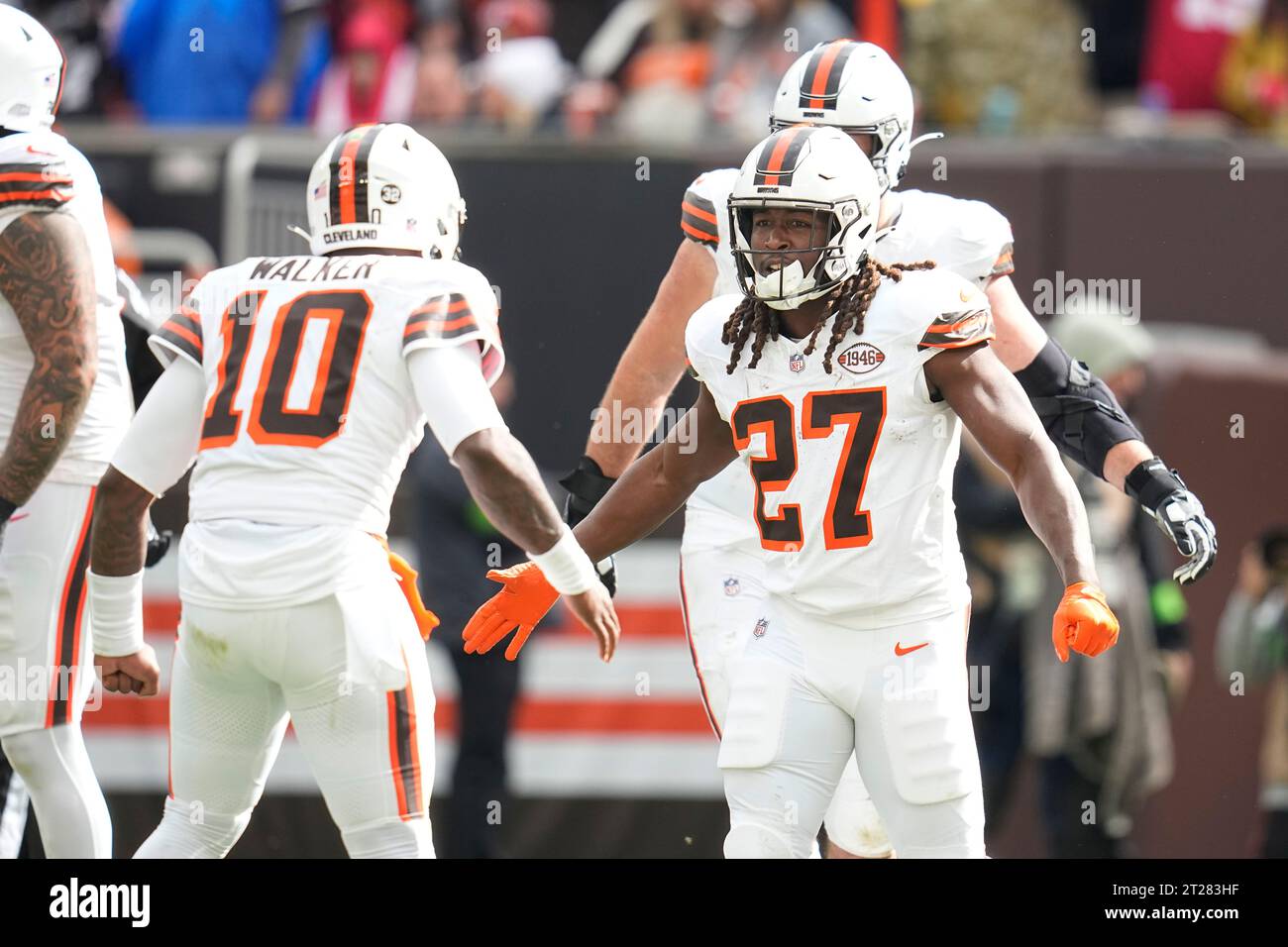 Cleveland Browns running back Kareem Hunt (27) is congratulated by ...