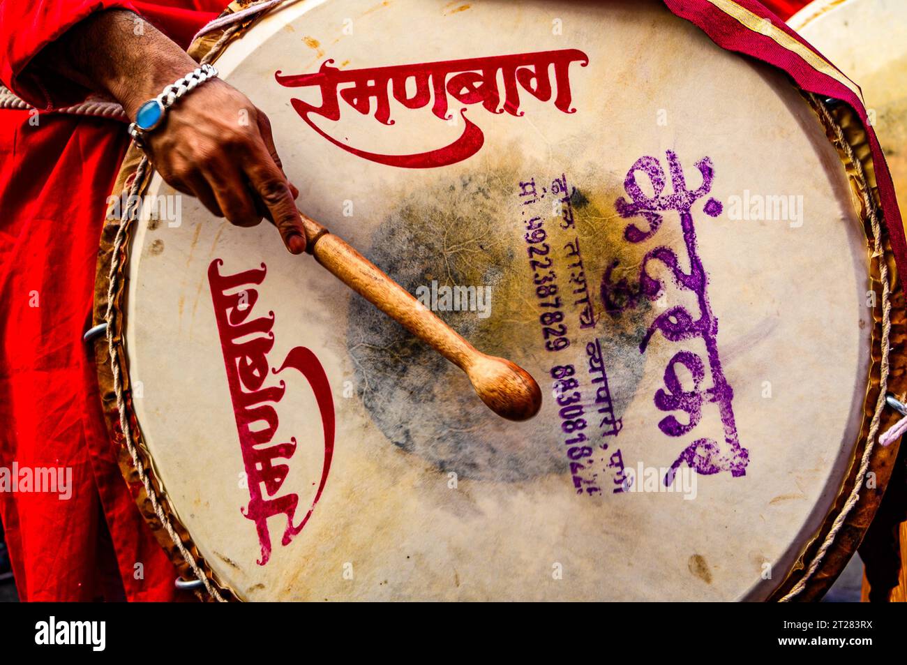 A close-up of traditional Indian drums, known as Dhol Tasha, being ...