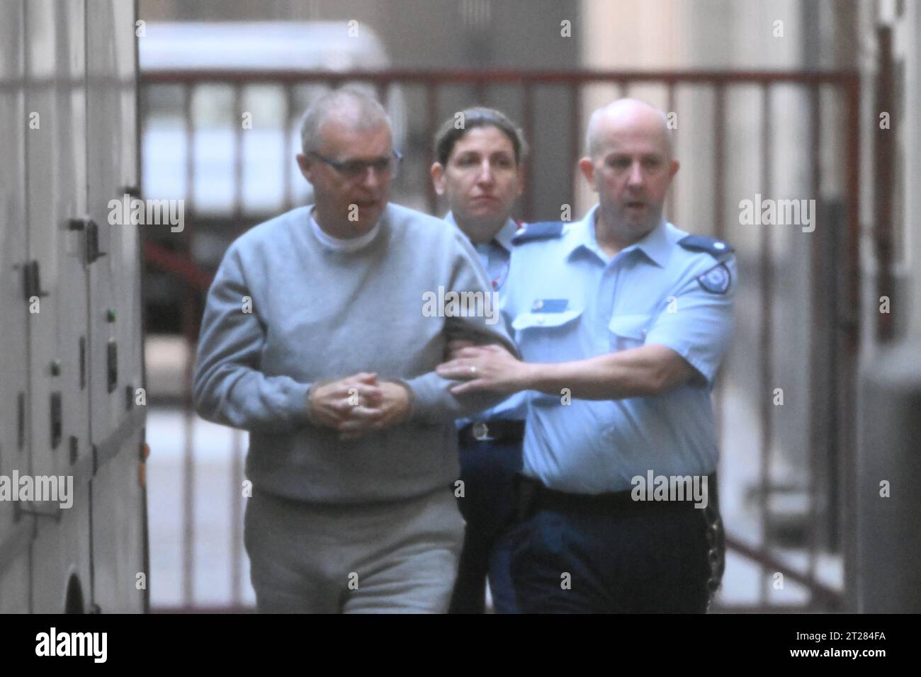 Melbourne, Australia. 18th Oct, 2023. Peter John Wetzler (left) arrives ...