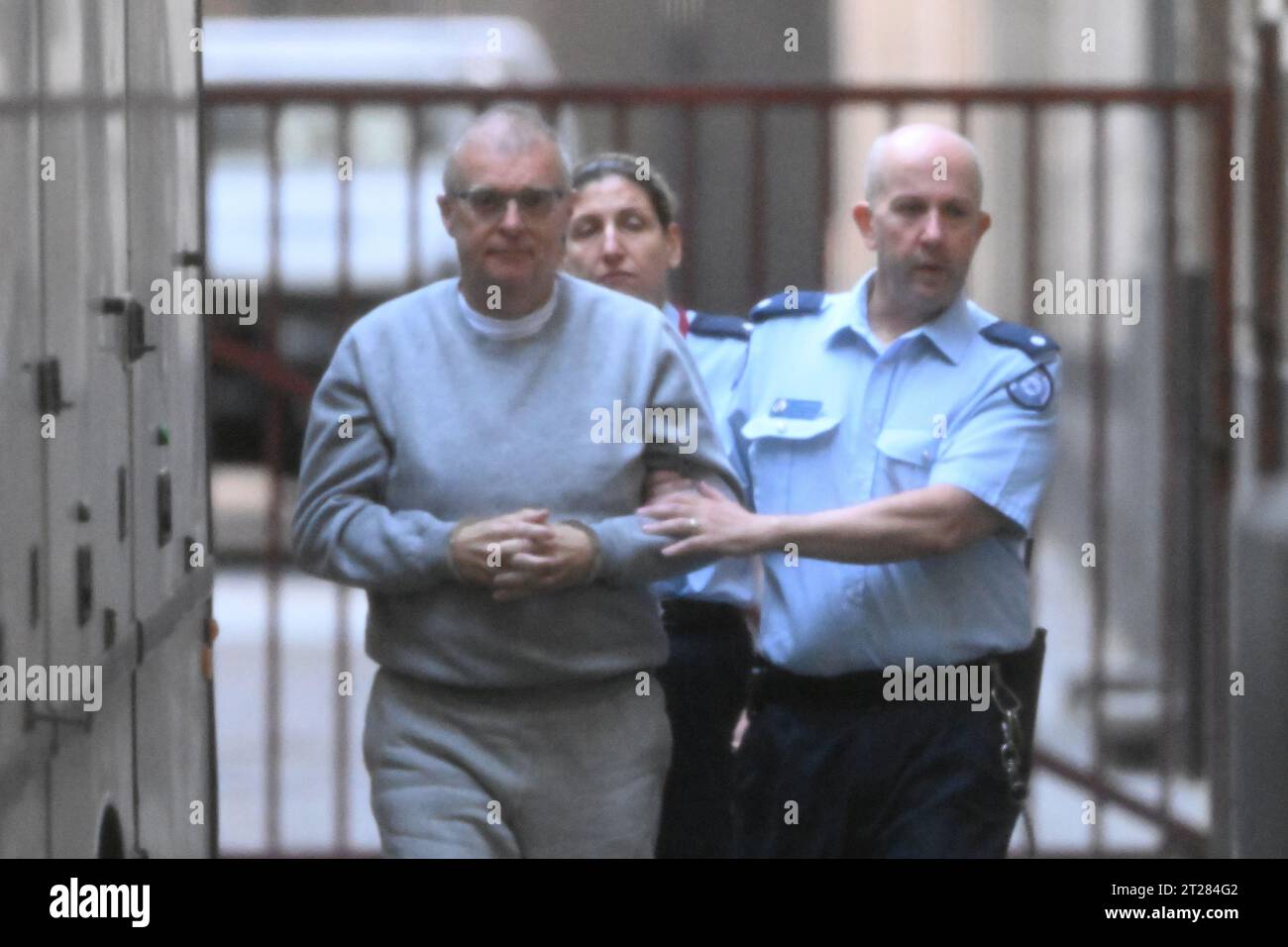 Melbourne, Australia. 18th Oct, 2023. Peter John Wetzler (left) arrives ...