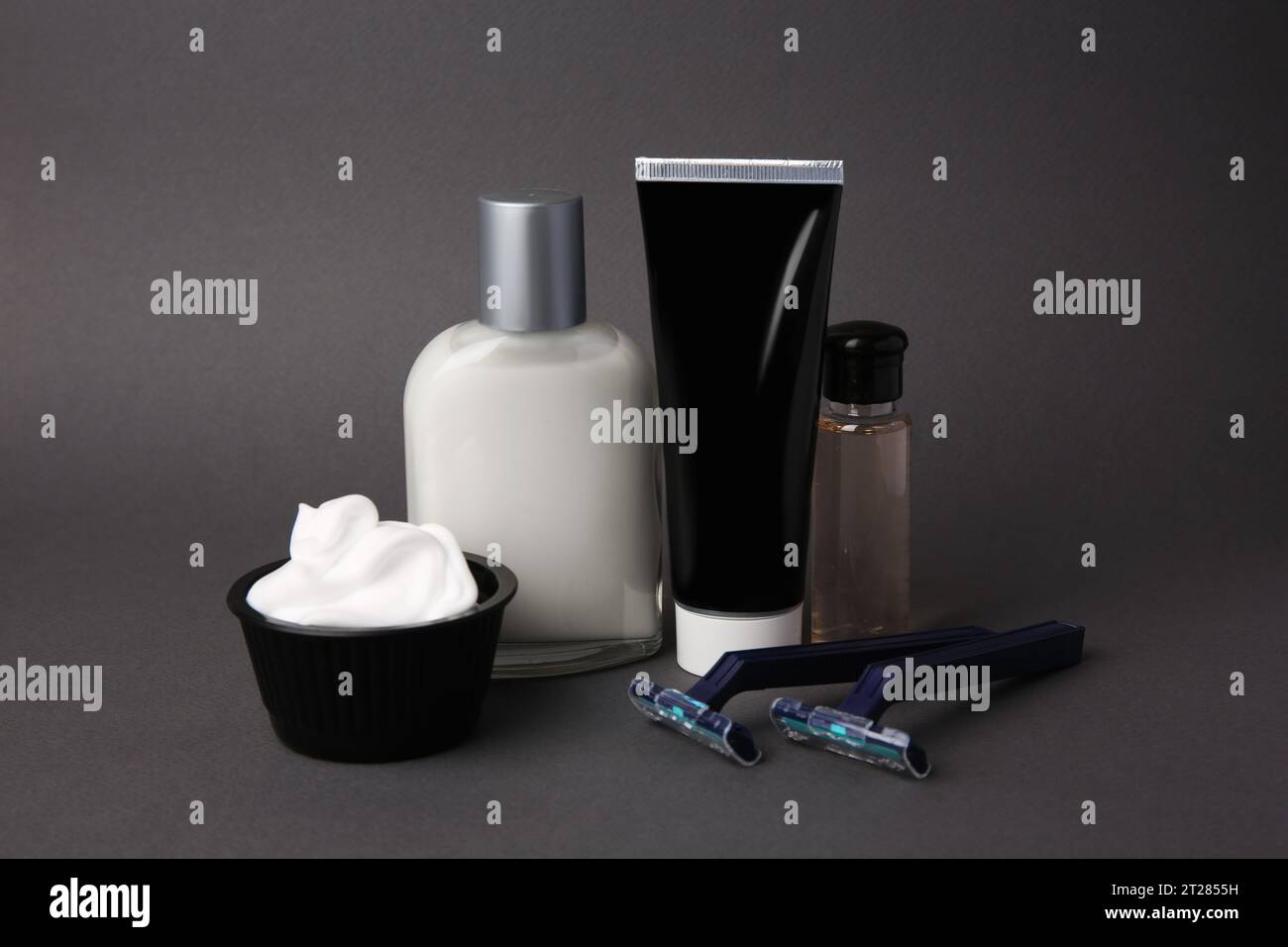 Different men's shaving accessories on grey background Stock Photo - Alamy