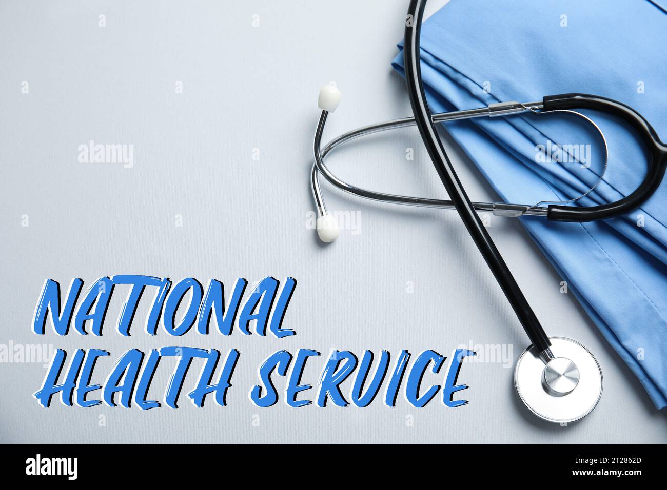 National health service (NHS). Stethoscope, scrubs and text on light ...