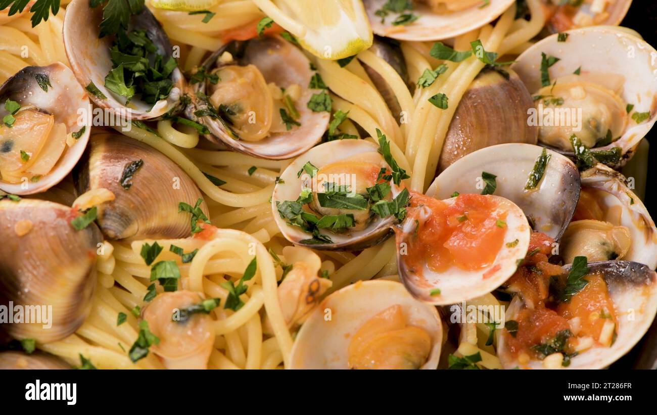 Traditional italian seafood pasta with clams Spaghetti alle Vongole ...