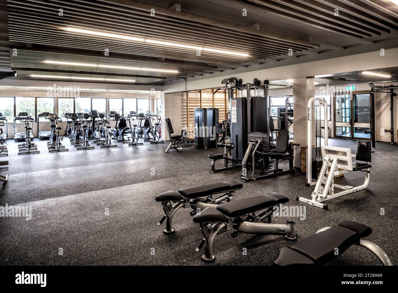 A general view of a equipment in a Gymnasium Stock Photo - Alamy