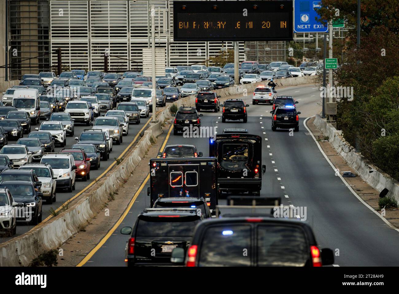 United States President Joe Bidens motorcade drives along the Dwight D ...