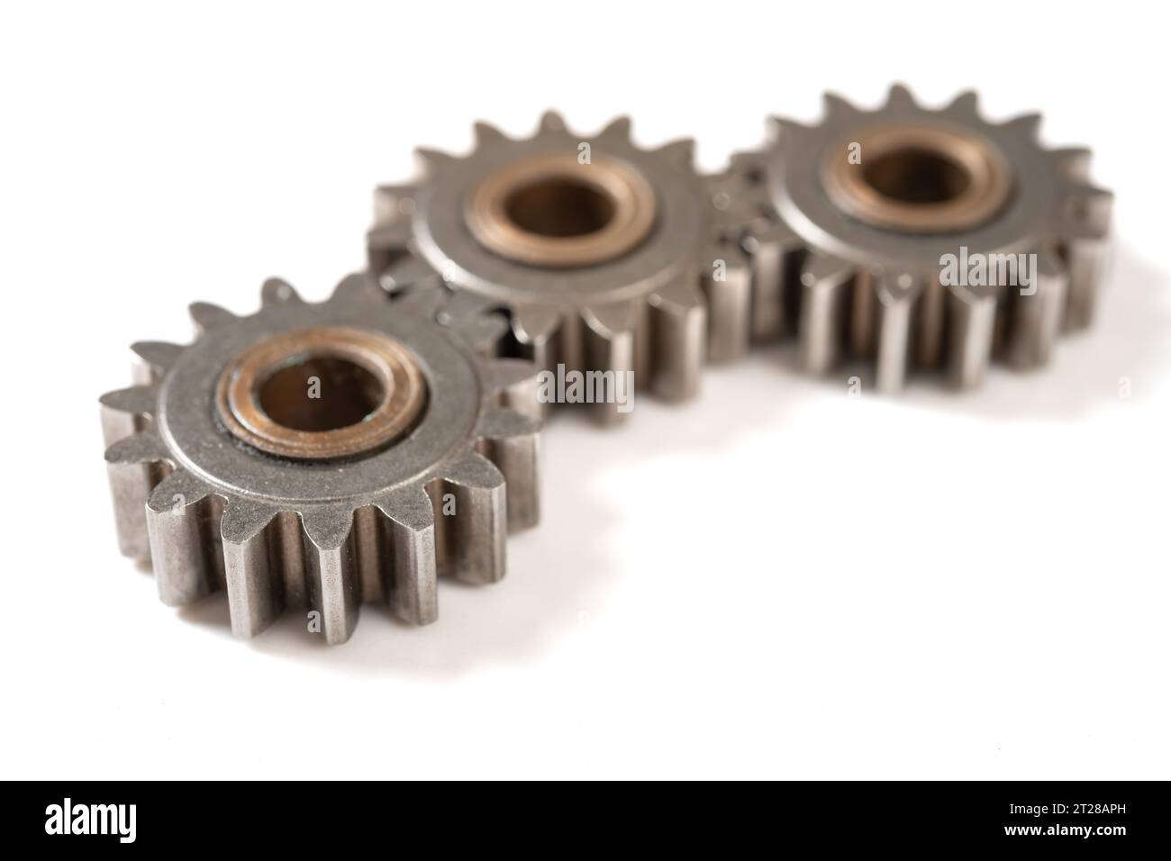 angle view gears on a white background Stock Photo - Alamy