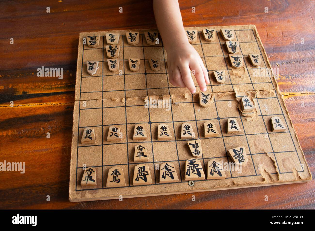 Wood boards of japanese chess or Shogi strategy board game on wooden ...
