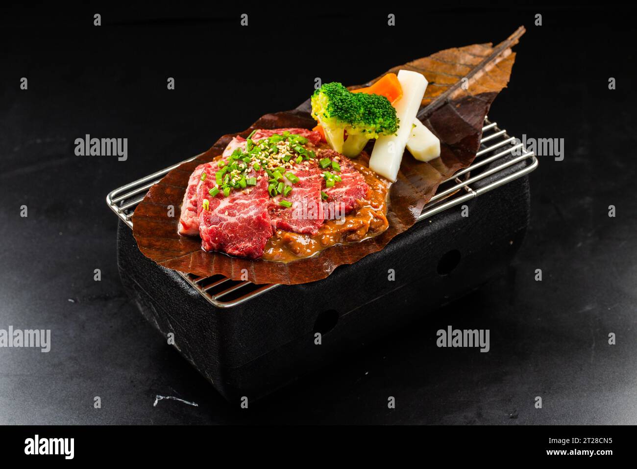 Charcoal grilled Hida beef on Hoba miso, Japanese local dish,Grilled ...