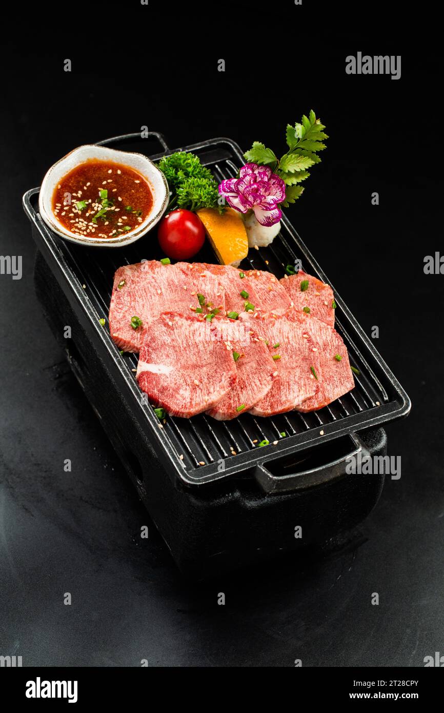 Salt Grilled beef tongue,Japanese food Stock Photo - Alamy