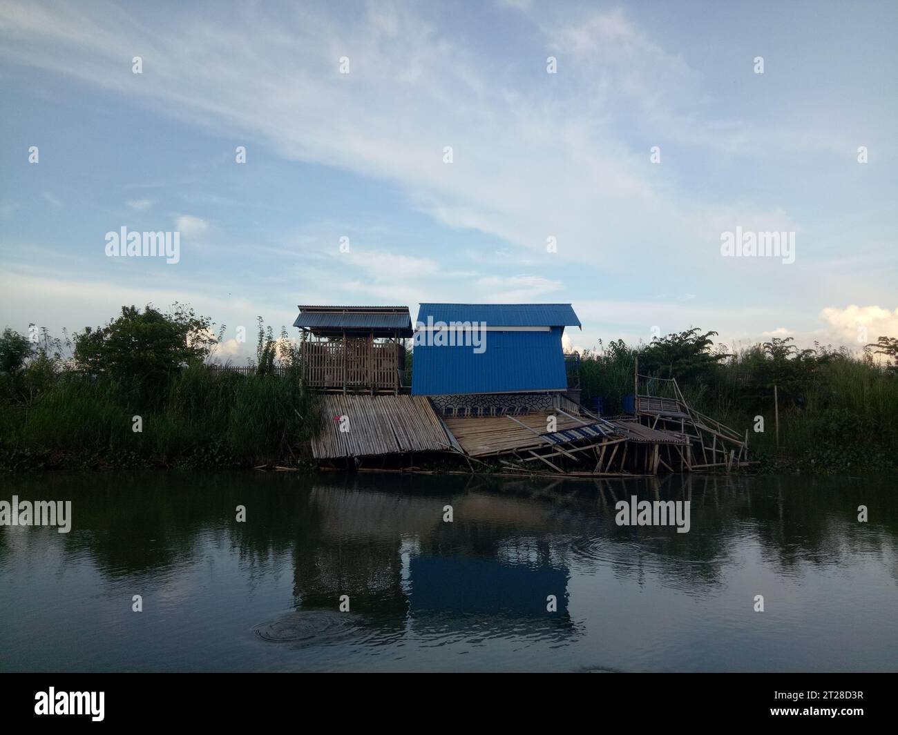 broken hut by the river Stock Photo - Alamy