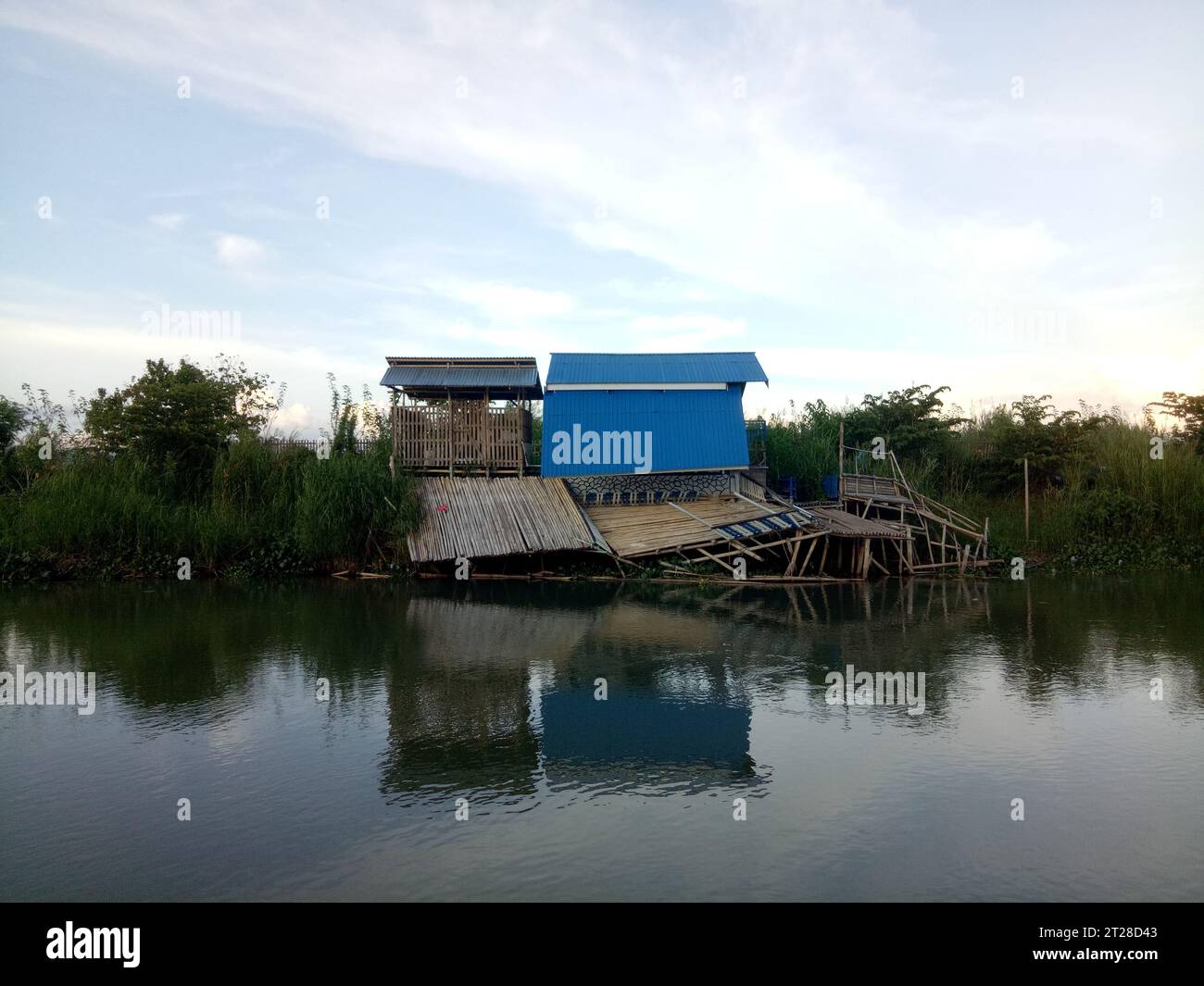broken hut by the river Stock Photo - Alamy