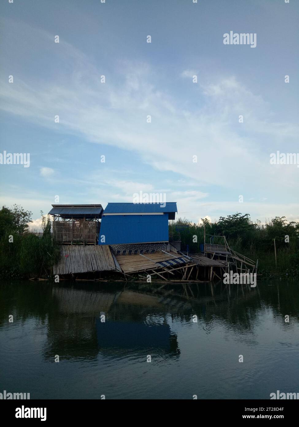 broken hut by the river Stock Photo - Alamy