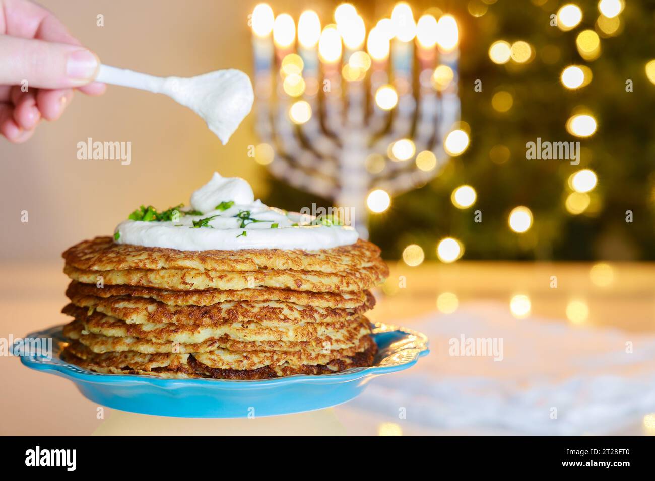 Traditional Jewish food dish during Hanukkah is crispy potato latkes ...