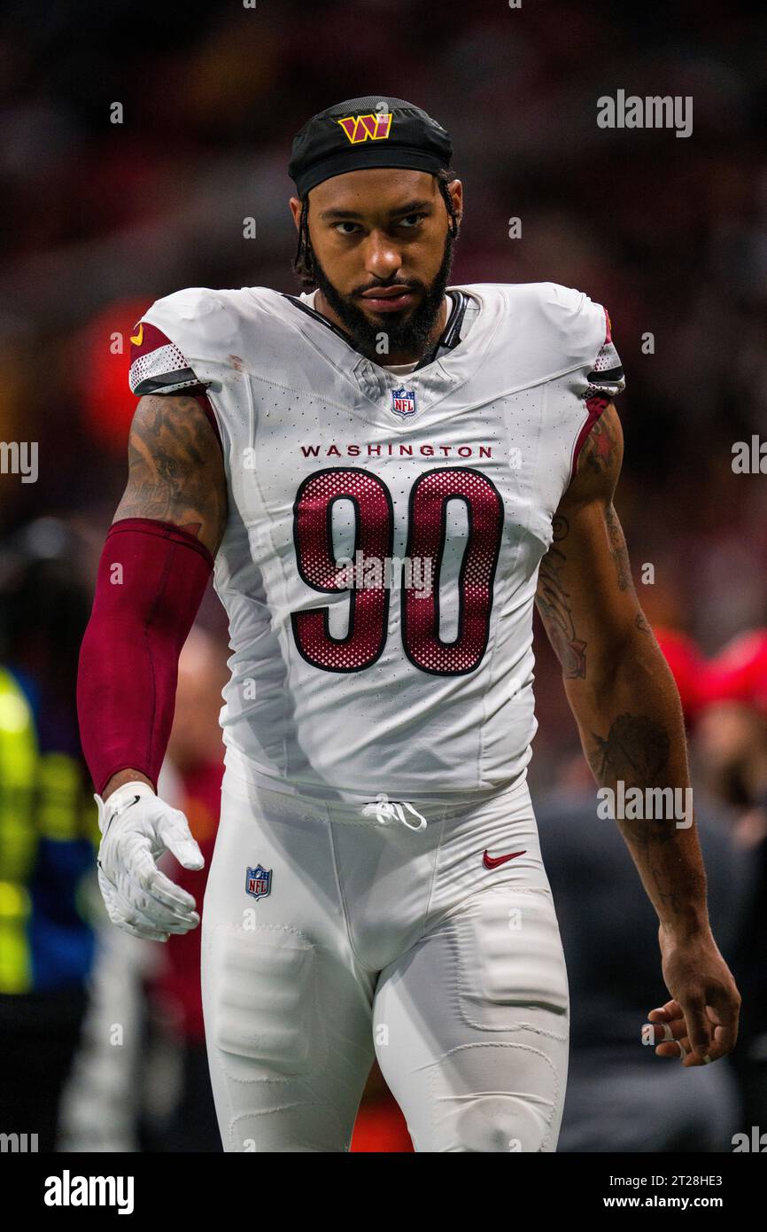 Washington Commanders defensive end Montez Sweat (90) walks to the ...