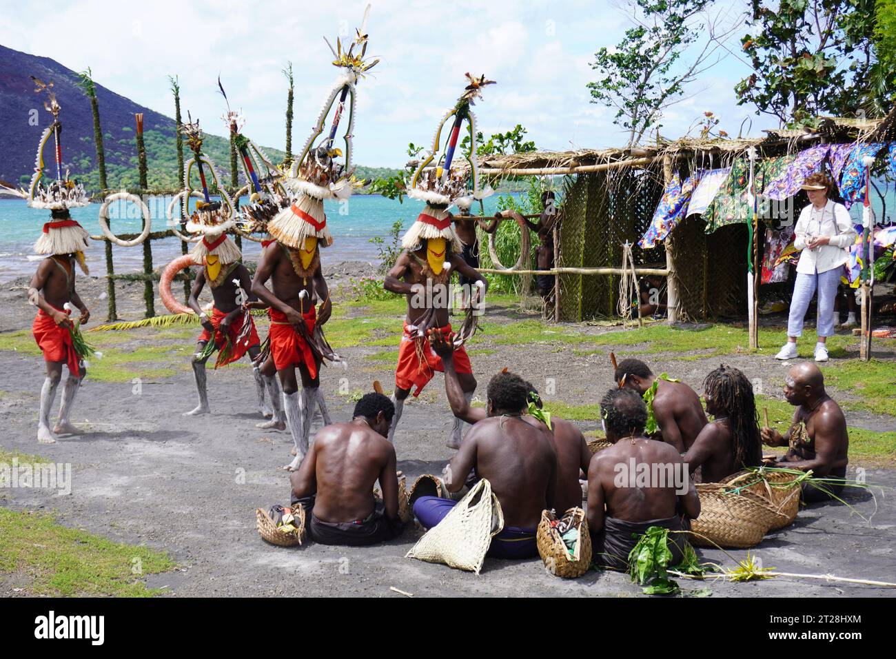 Masked Dancers performing in Front of Seated Musicians at a Mask ...