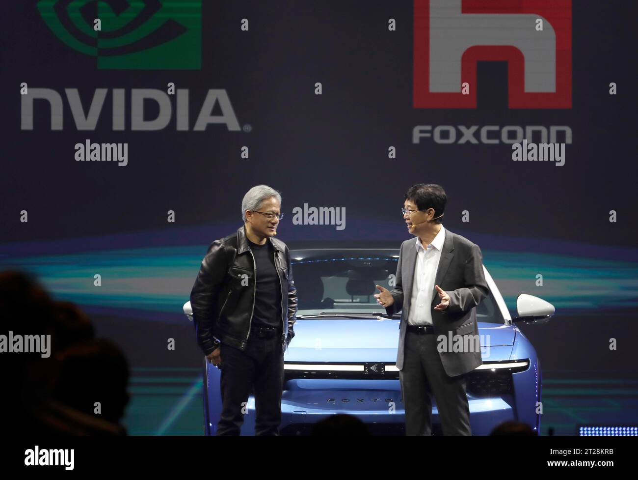 Co-founder, president and CEO of Nvidia Corporation Jensen Huang, left ...