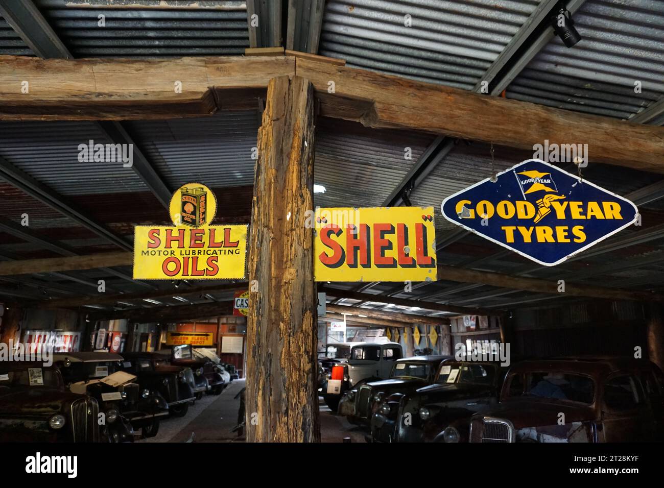 Old-fashioned retro signs of shell oil and goodyear tyres in historic ...