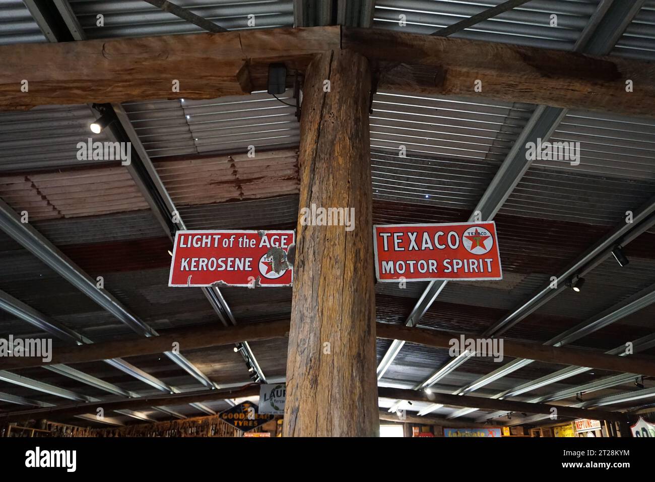 Old-fashioned retro signs of texaco motor spirit in historic village ...