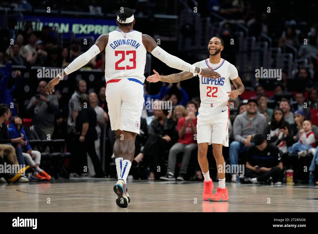 Los Angeles Clippers forward Robert Covington (23) and Xavier Moon (22 ...