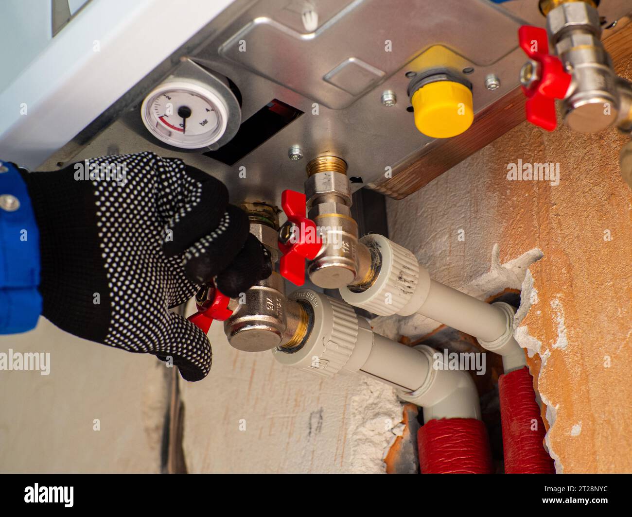 Installing heating and water pipes in apartment Stock Photo - Alamy