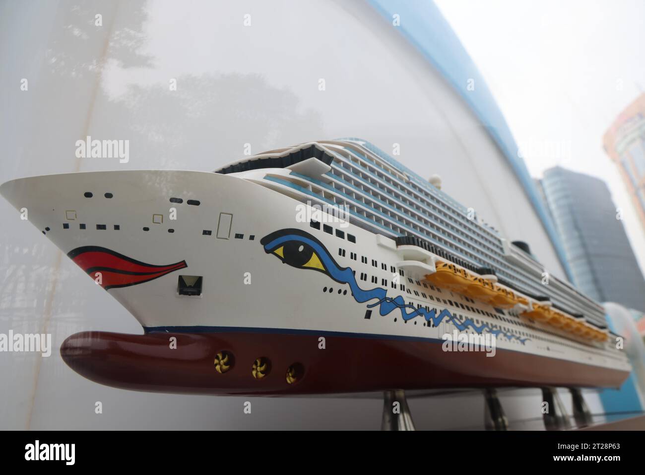 A model of the cruise ship Adora Magic City at North Bund Garden draws ...