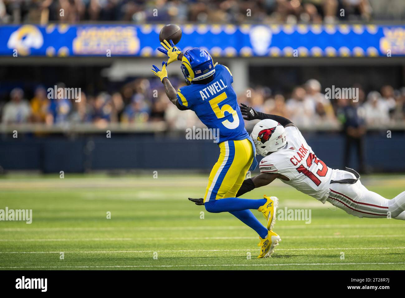 Los Angeles Rams wide receiver Tutu Atwell (5) catches the ball over ...