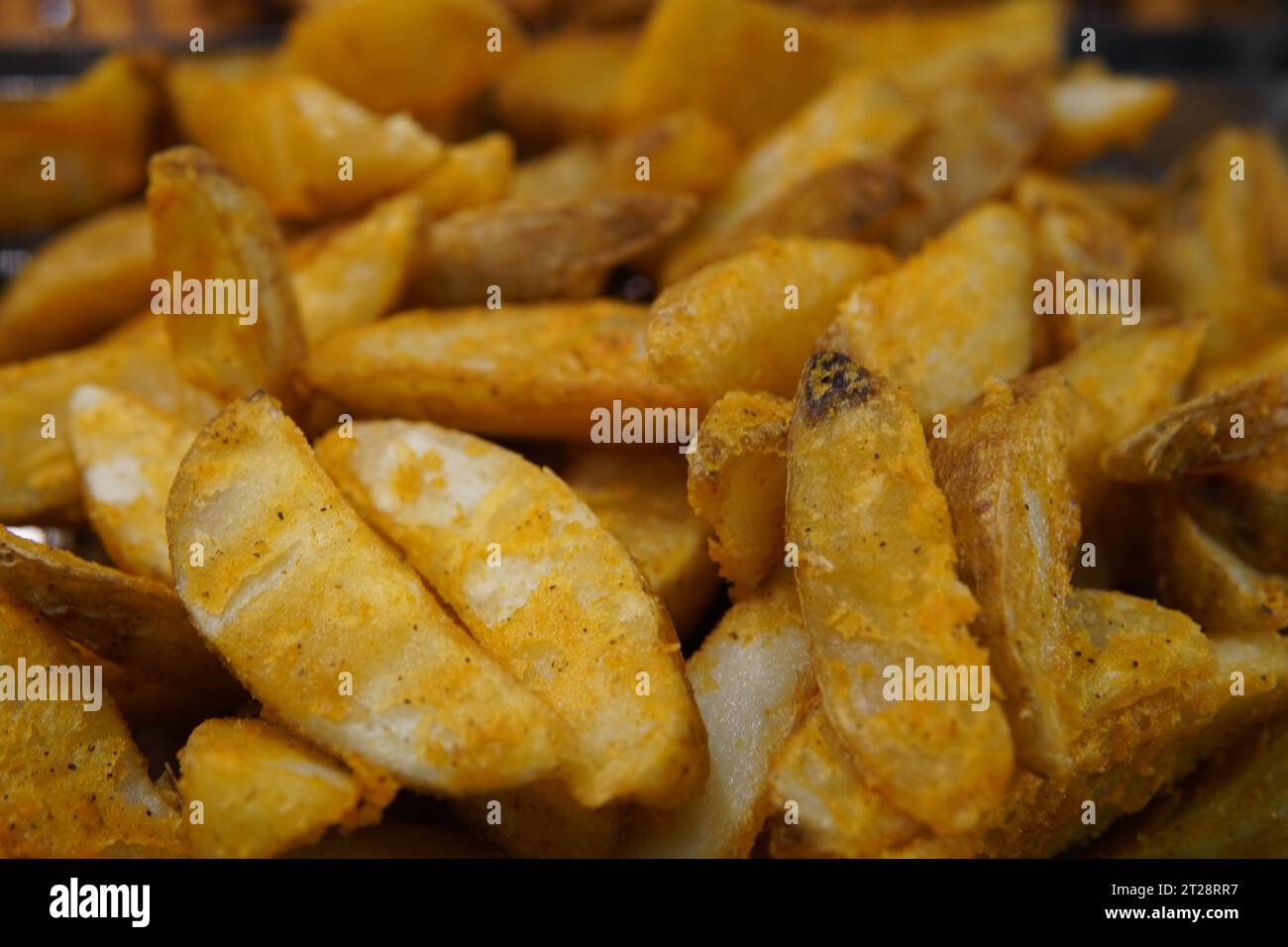Crispy potato wedges hi-res stock photography and images - Alamy