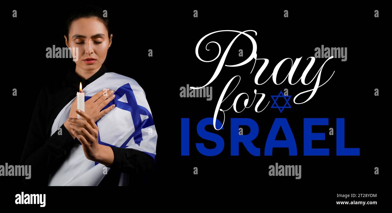 Praying Jewish woman with candle and flag on dark background. Israel ...