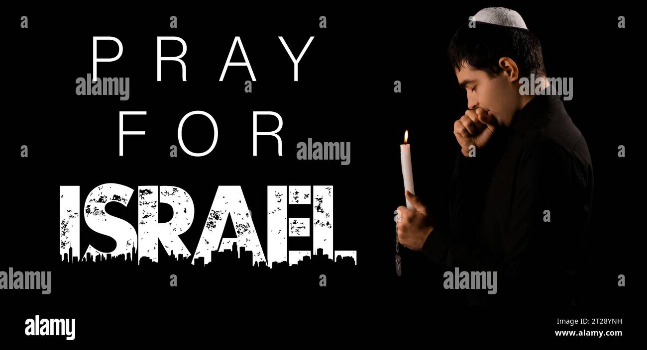 Praying Jewish man with candle on dark background. Israel-Hamas war ...