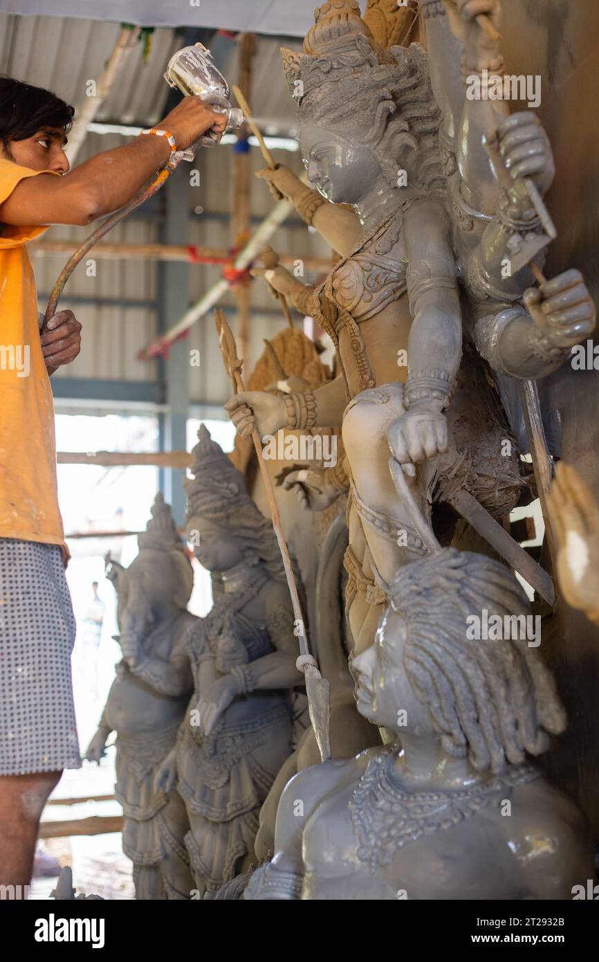 Birbhum, West Bengal, India - October 14th 2023: An artist is painting ...