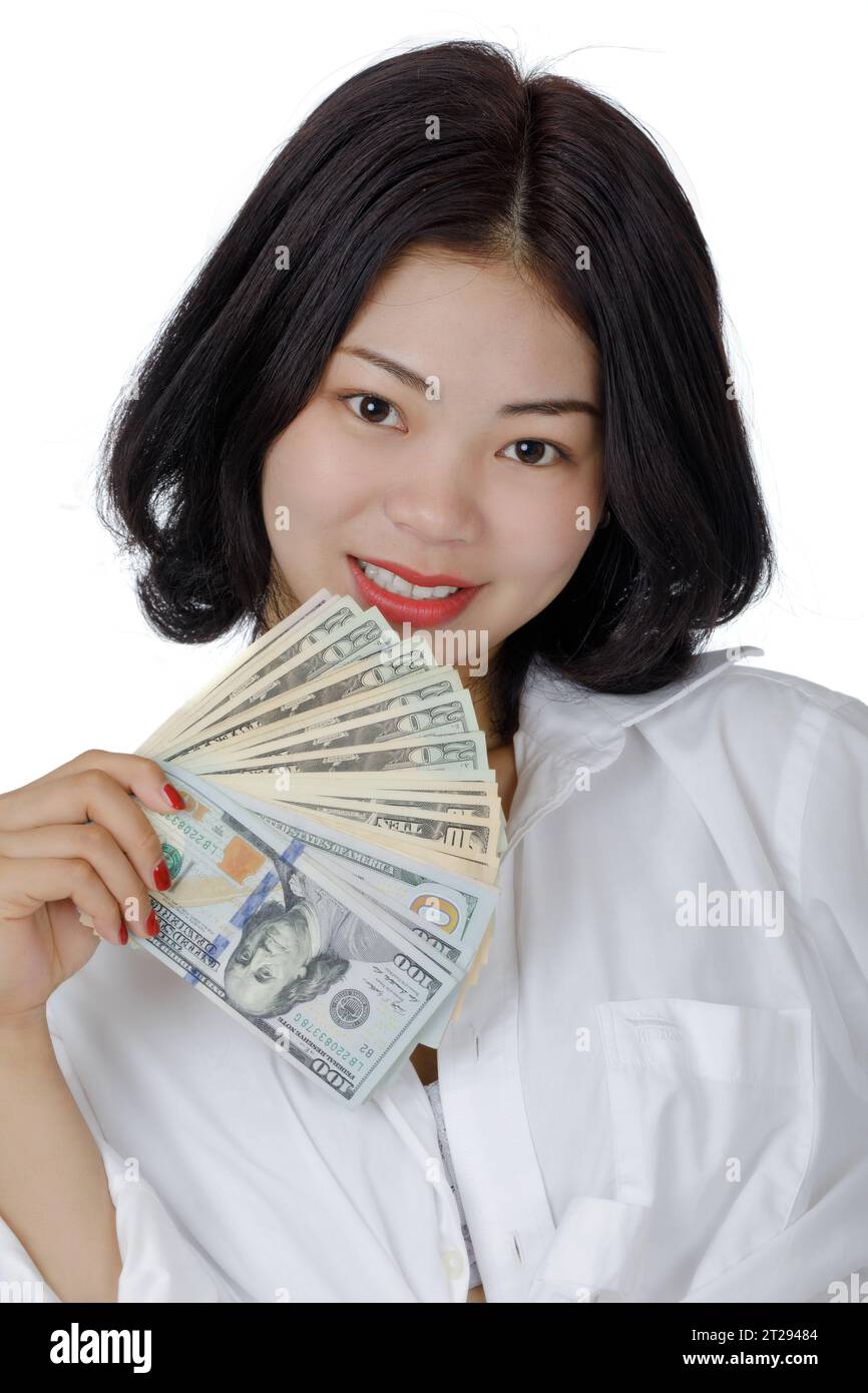 A beautiful Chinese American Woman holding United States Bank Notes ...