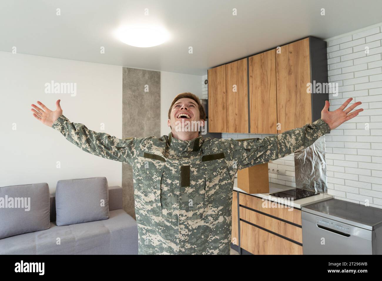 military man in new apartments Stock Photo - Alamy