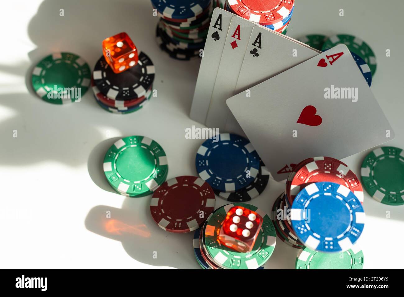 Colorful poker chips on white background Stock Photo - Alamy