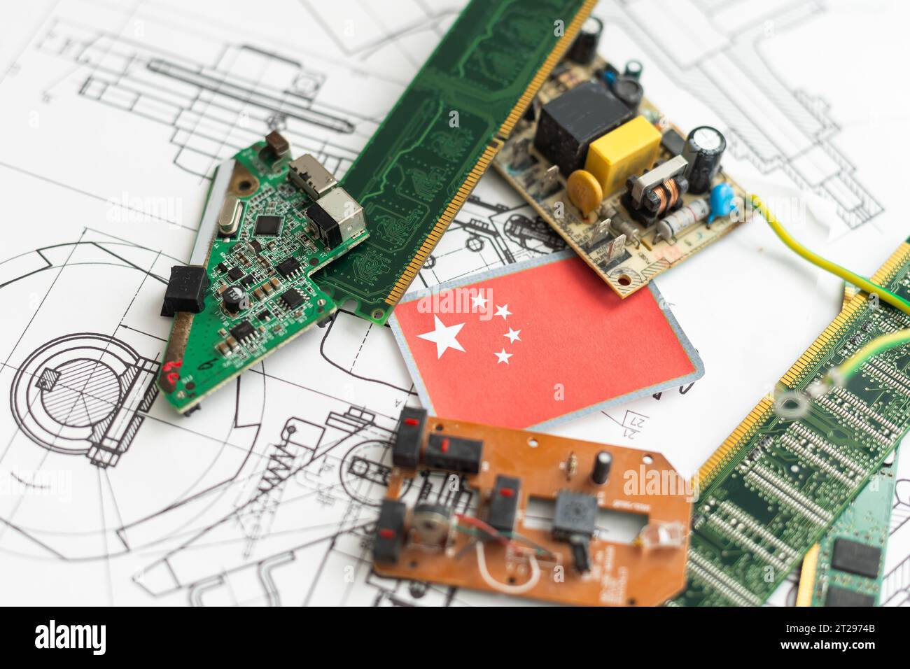 Group of electronic components with schematics in the background Stock ...