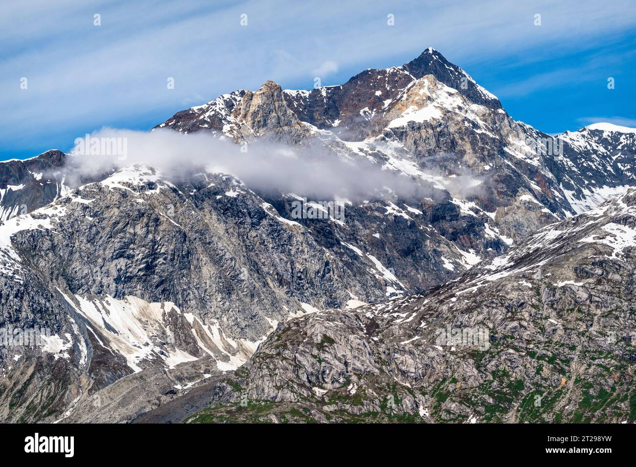 Mist among the mountain peaks in Johns Hopkins Inlet, Glacier Bay ...