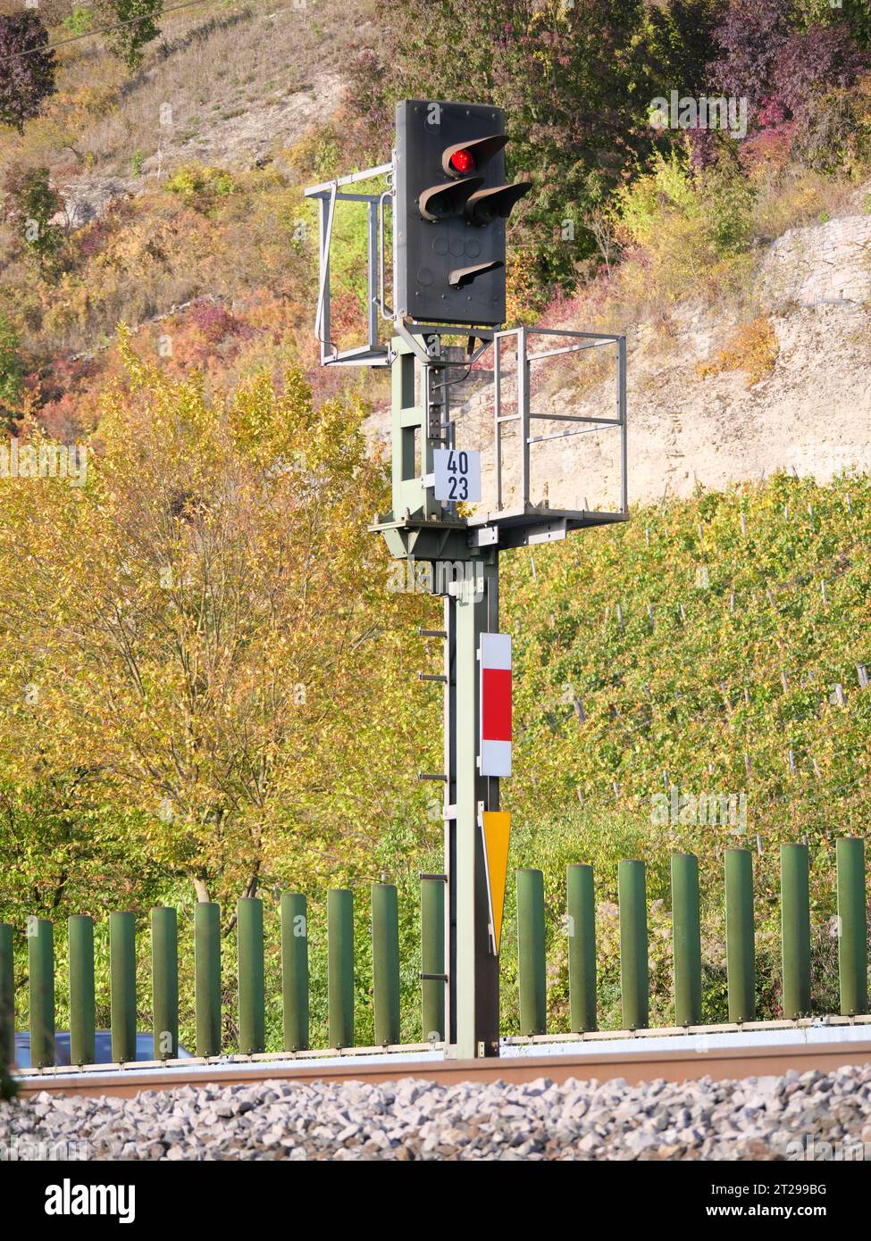 A railroad signal as a railroad traffic light stands on red Stock Photo ...