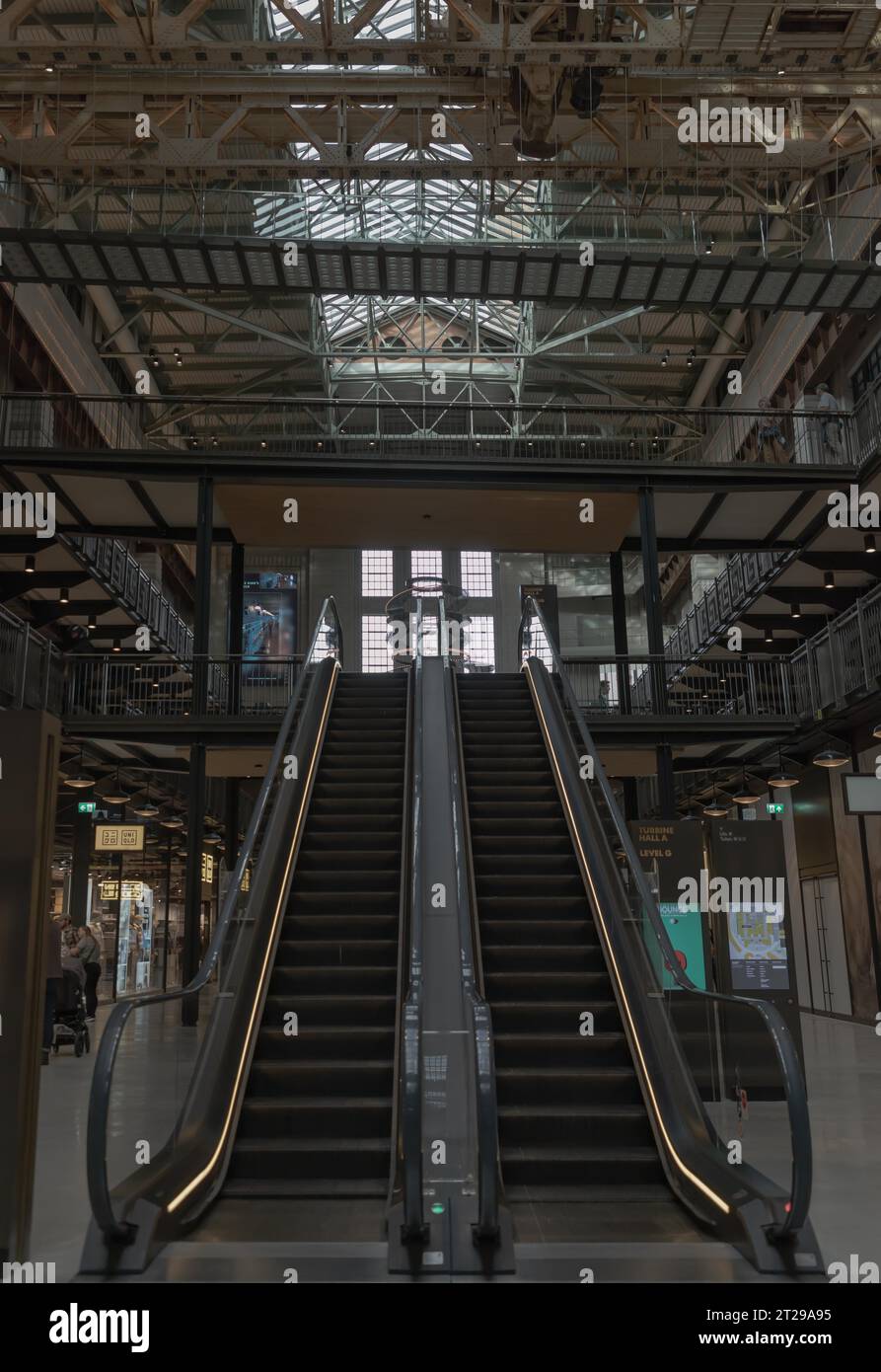 London, UK - Oct 13, 2023 - View of Two interior escalators and an old ...