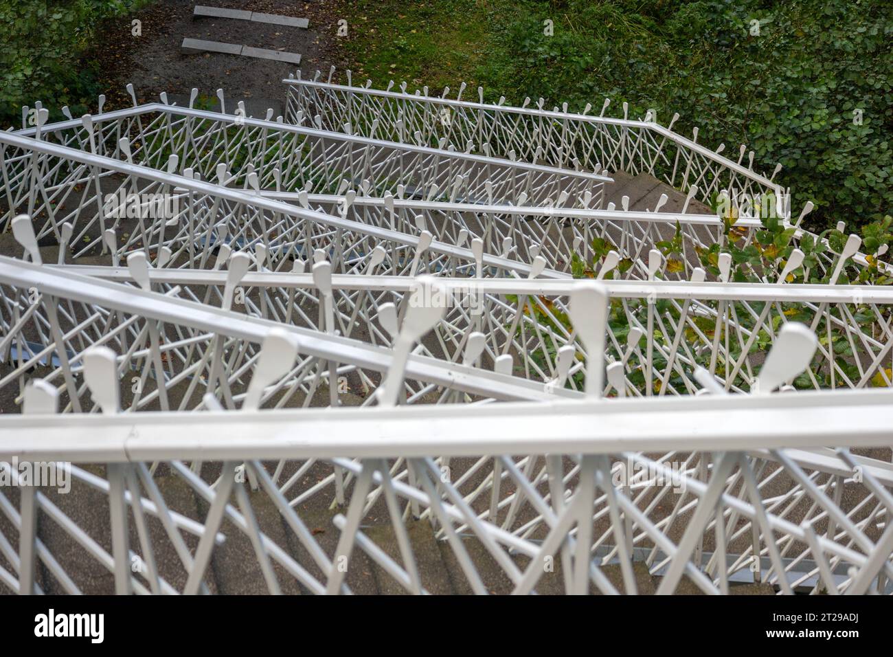 White metal marks spiral down Stock Photo - Alamy