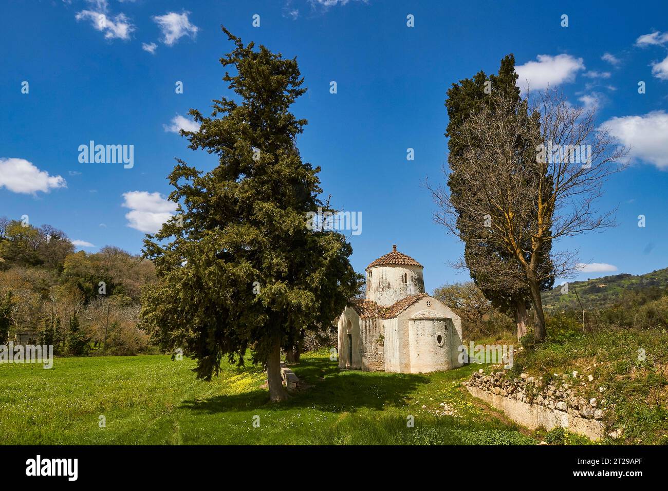 Agia Paraskevi, chapel, cedars, green meadow, blue sky, white clouds ...