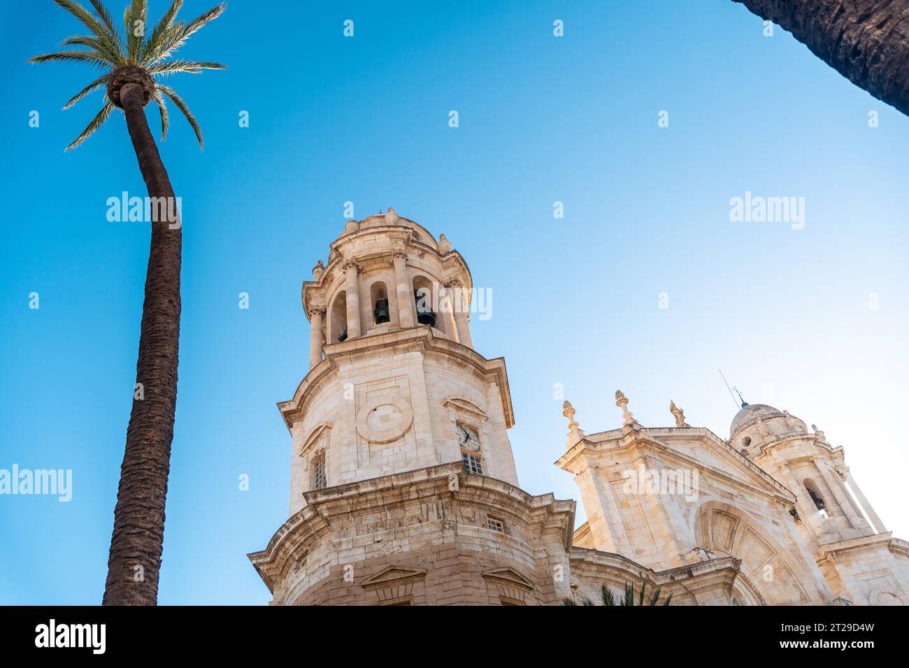 Towers and the facade of the Holy Cathedral Church in the city of Cadiz ...