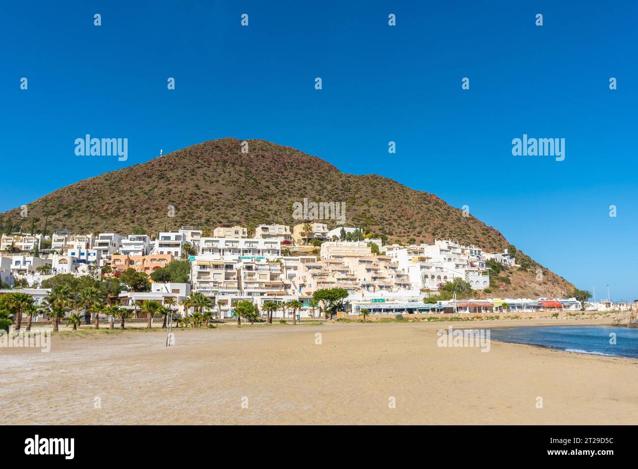 White house in the mountains on the beach of San Jose in the town of ...