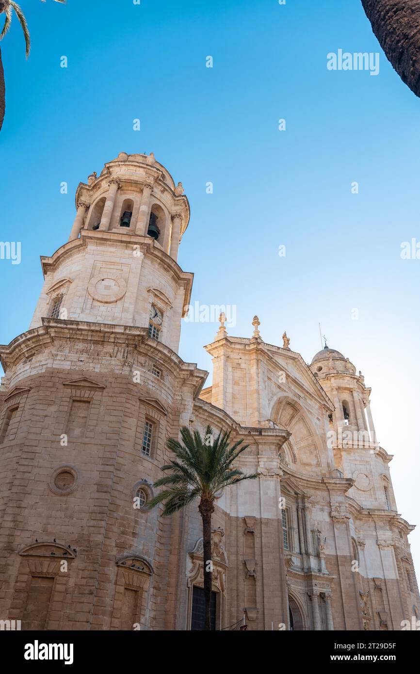 Towers and the facade of the Holy Cathedral Church in the city of Cadiz ...