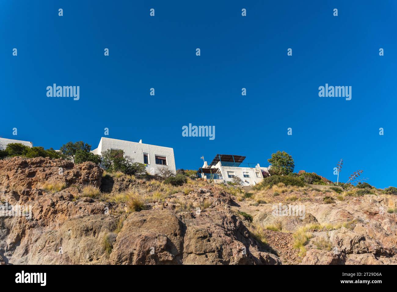 White houses on the top of San Jose beach in the town of Nijar, Almeria ...